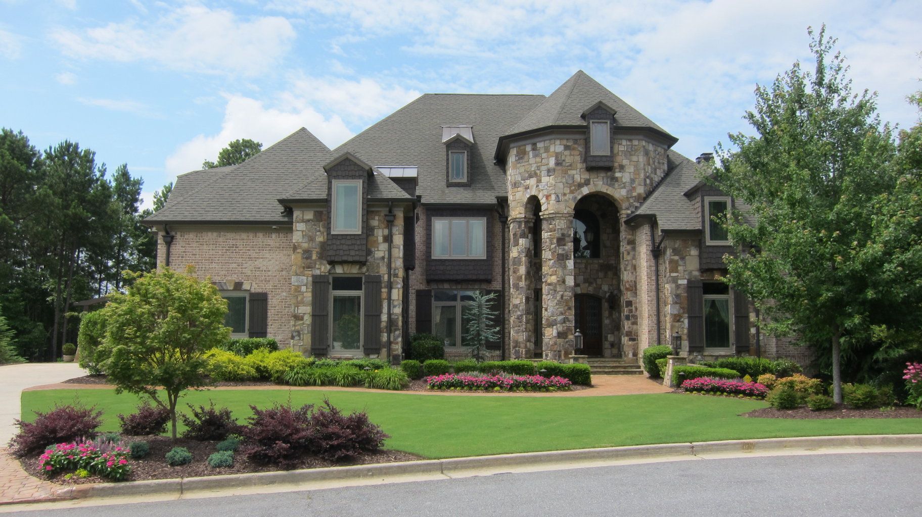 Locations Hub - Canton stone suburban house