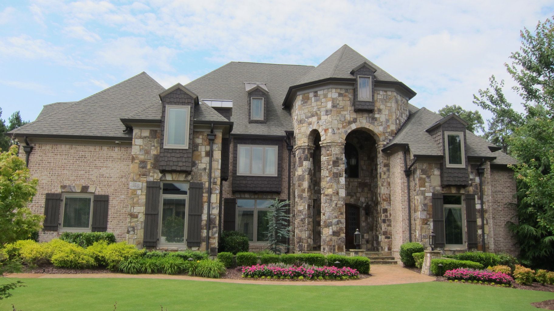 Locations Hub - Canton stone suburban house