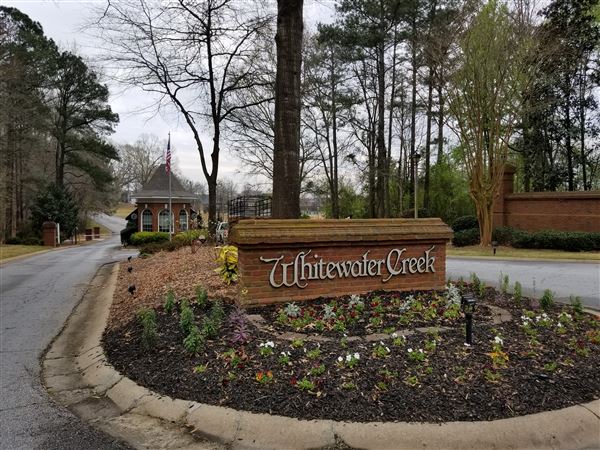 Locations Hub - Whitewater Creek Country Club and guard gate